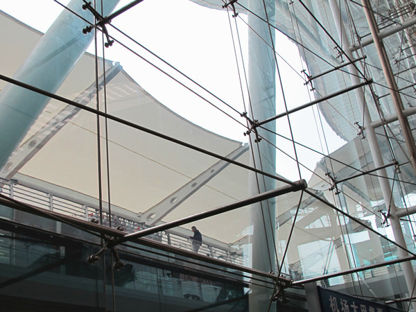 Non-linear analysis of a point-fixed glass curtain wall cable-truss ...